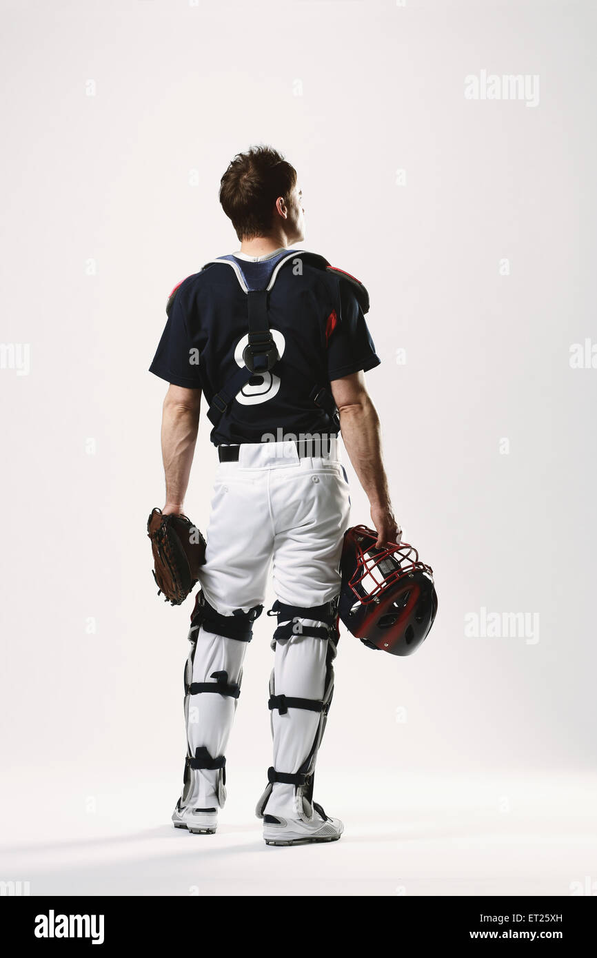 Baseball catcher against white background Stock Photo - Alamy