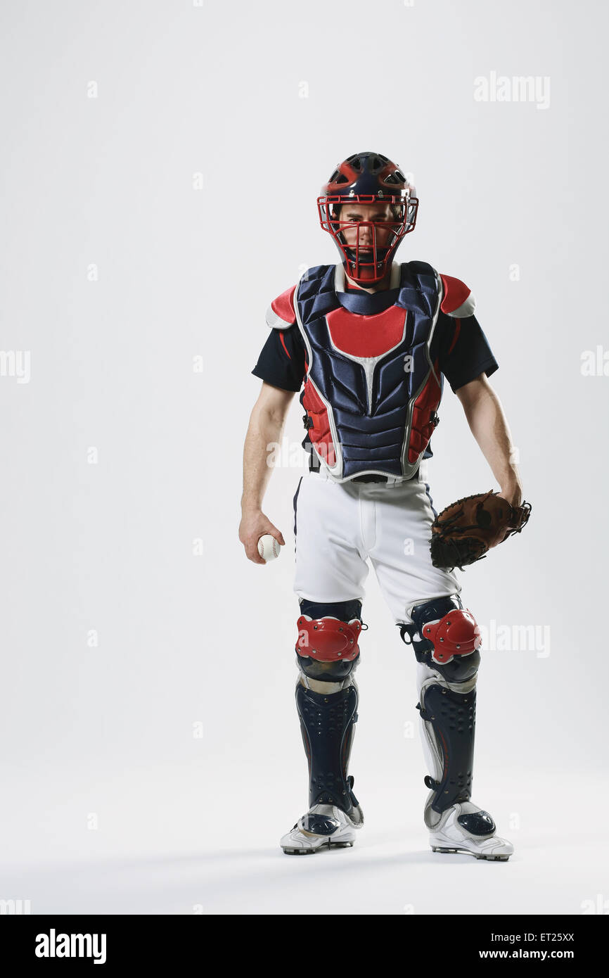 Baseball catcher against white background Stock Photo - Alamy