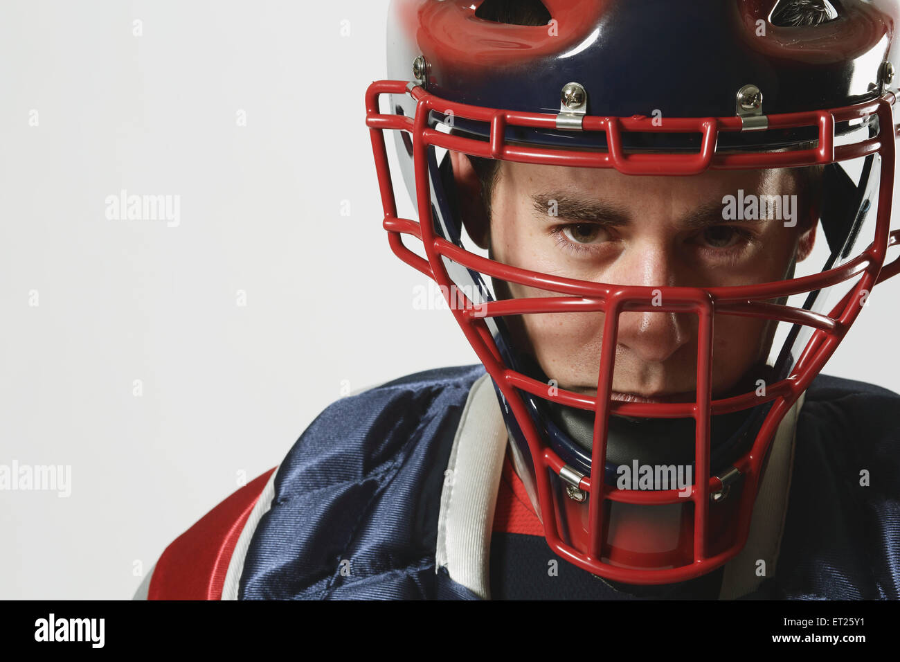 Baseball catcher against white background Stock Photo - Alamy