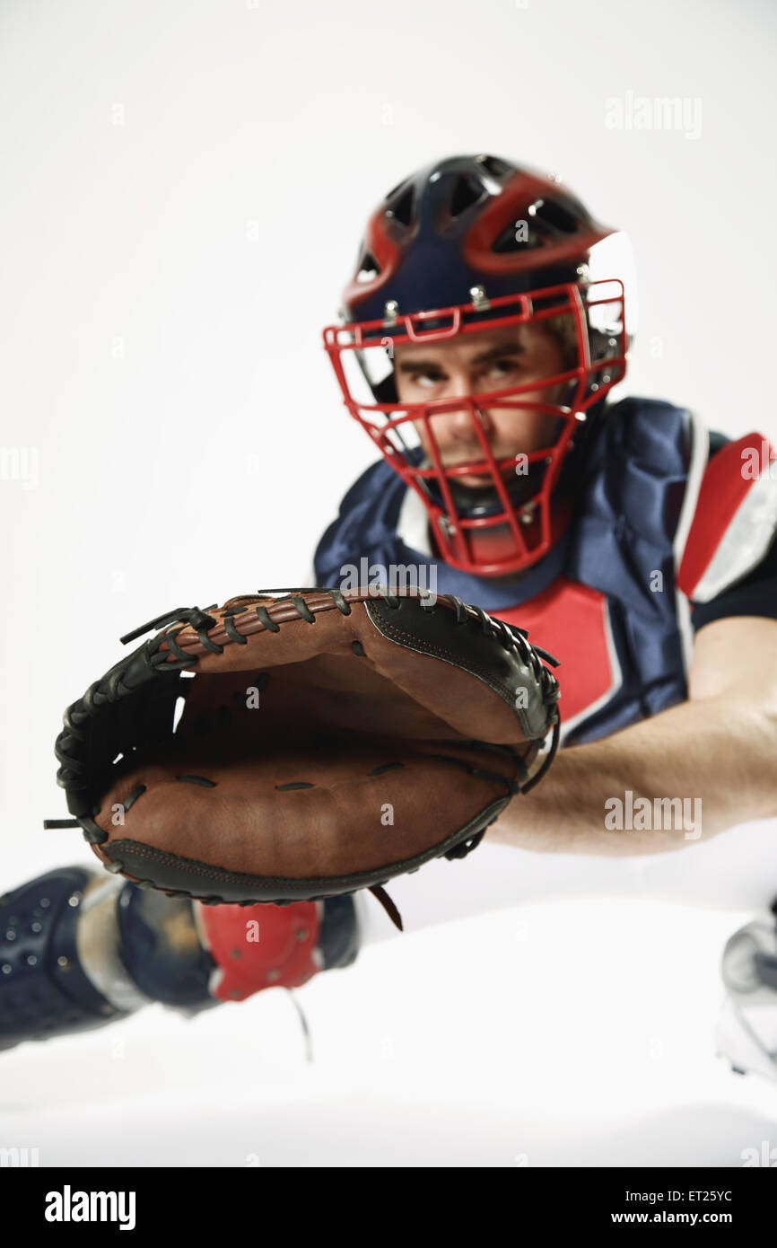 Baseball catcher against white background Stock Photo - Alamy
