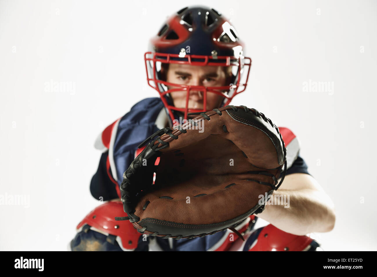 Baseball catcher against white background Stock Photo - Alamy