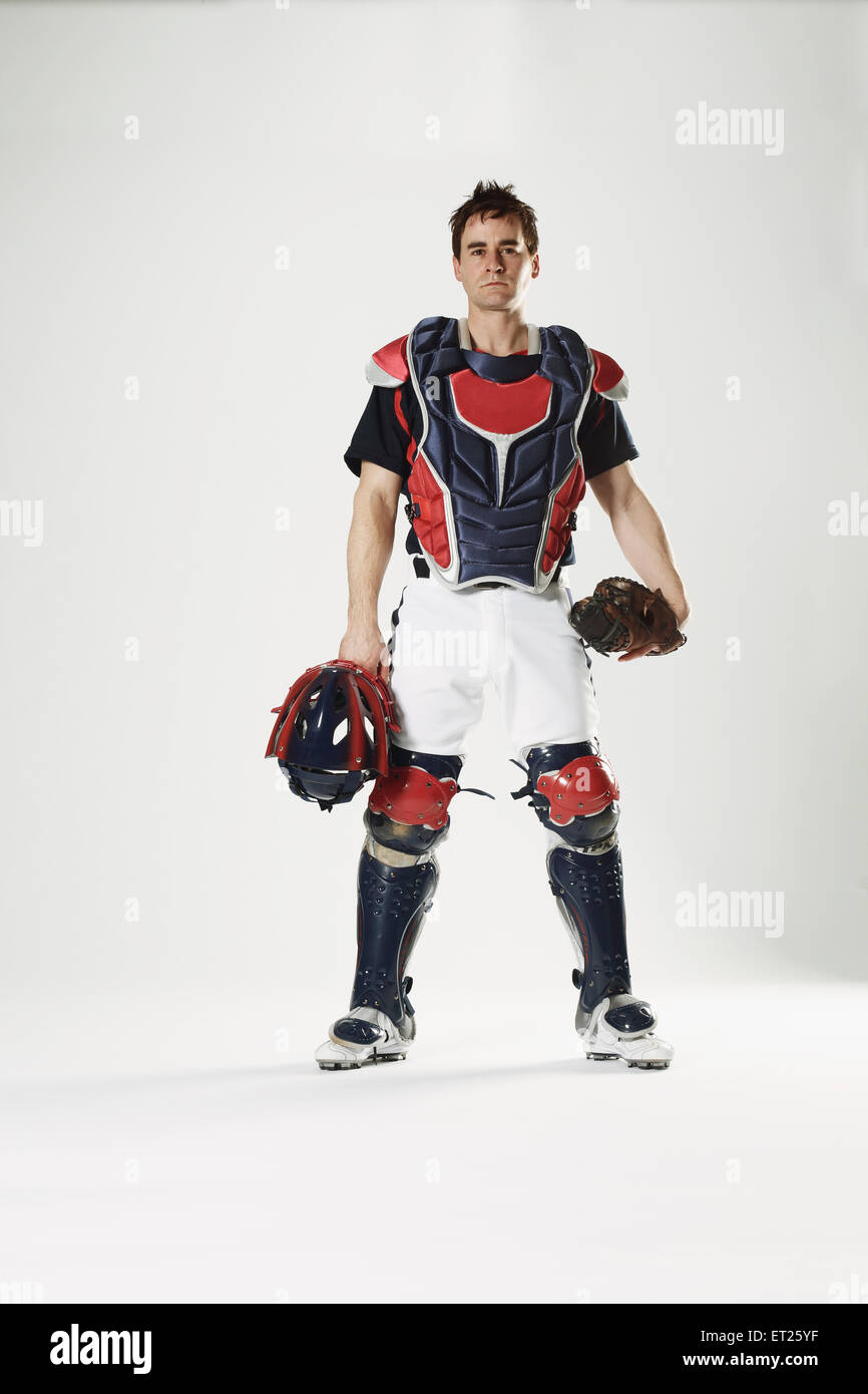 Baseball catcher against white background Stock Photo - Alamy