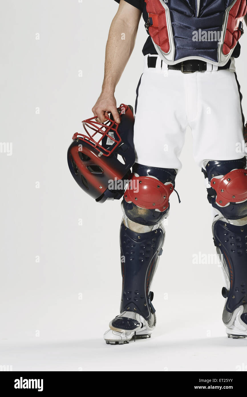 Baseball catcher against white background Stock Photo - Alamy