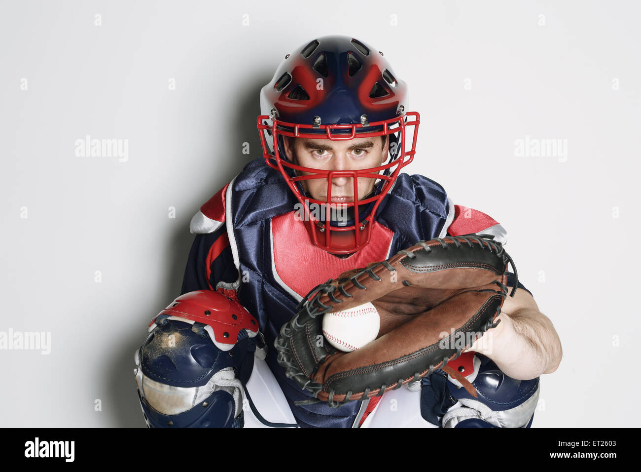 Baseball catcher against white background Stock Photo - Alamy