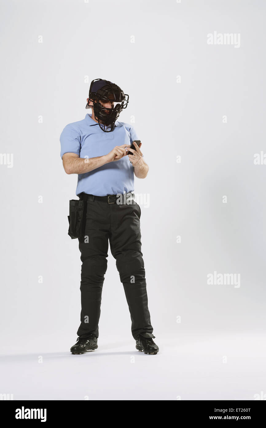 Baseball chief referee against white background Stock Photo - Alamy