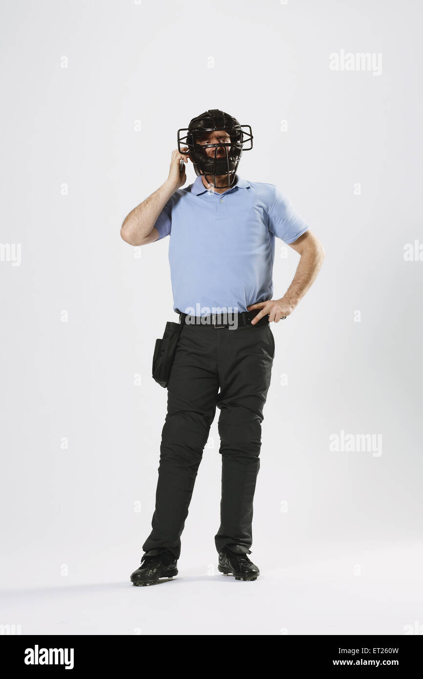 Baseball chief referee against white background Stock Photo - Alamy