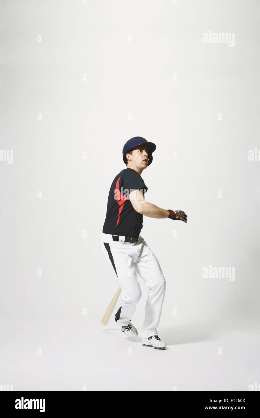 Baseball batter against white background Stock Photo - Alamy