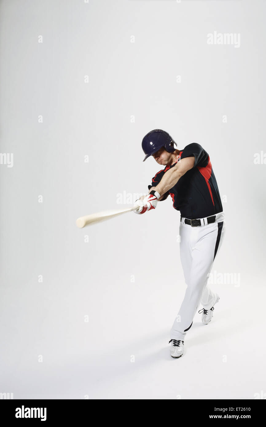 Baseball batter against white background Stock Photo - Alamy