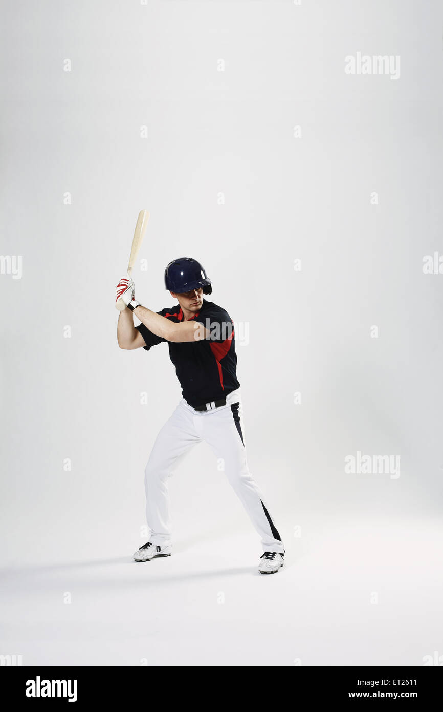 Baseball batter against white background Stock Photo - Alamy