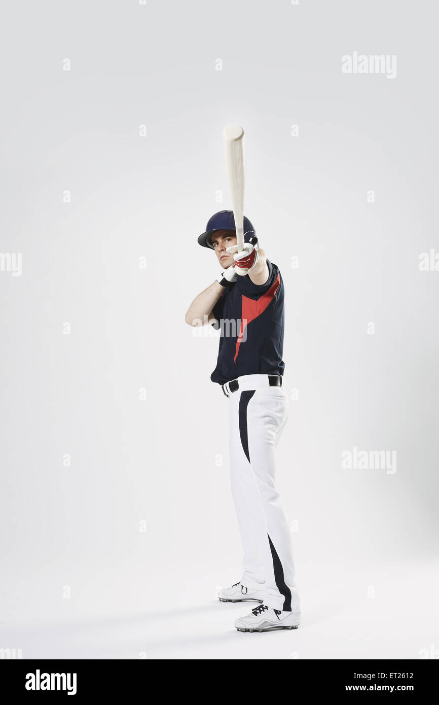 Baseball batter against white background Stock Photo - Alamy