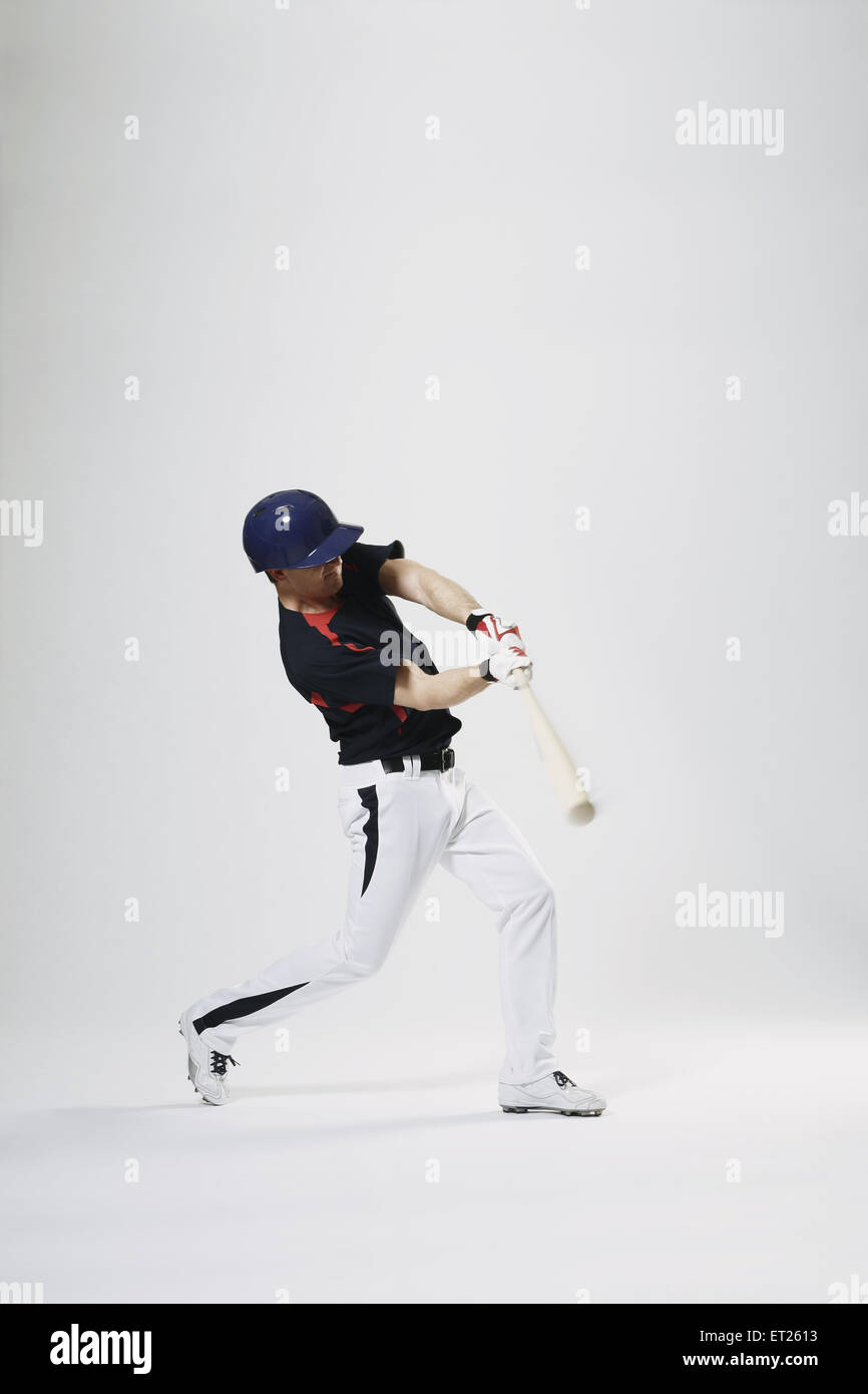 Baseball batter against white background Stock Photo - Alamy