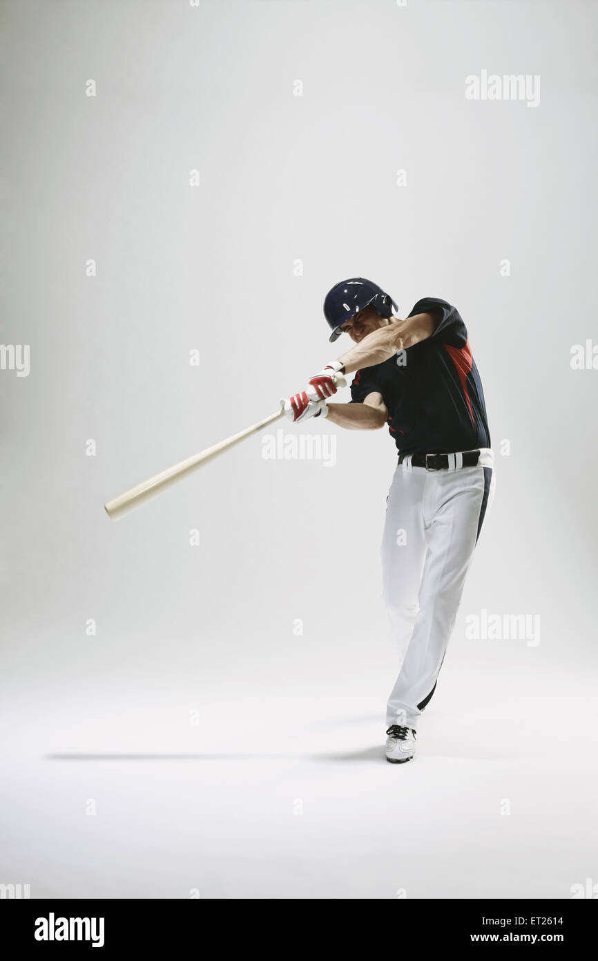 Baseball batter against white background Stock Photo - Alamy