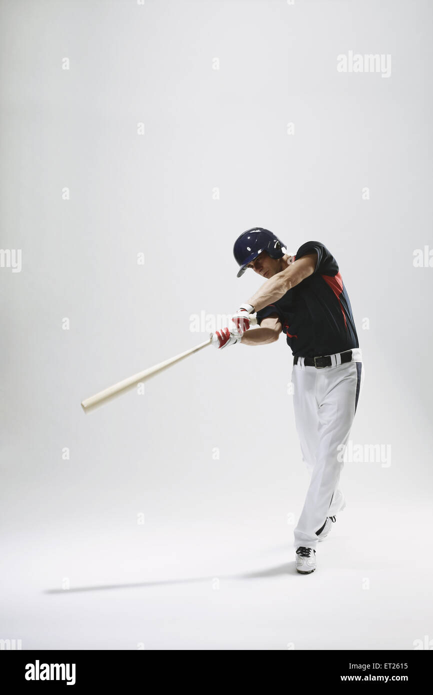 Baseball batter against white background Stock Photo - Alamy