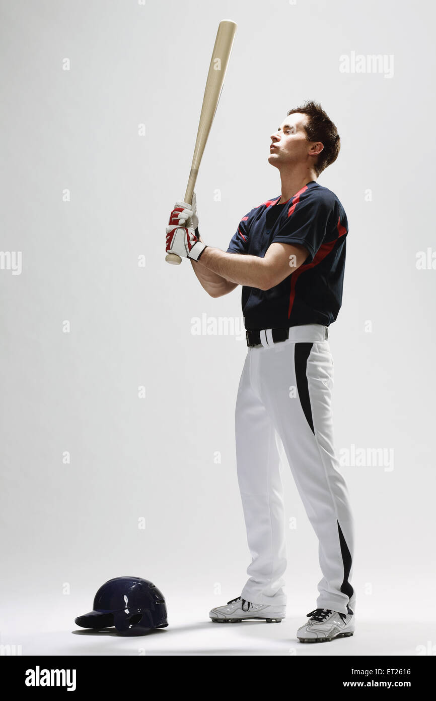 Baseball batter against white background Stock Photo - Alamy