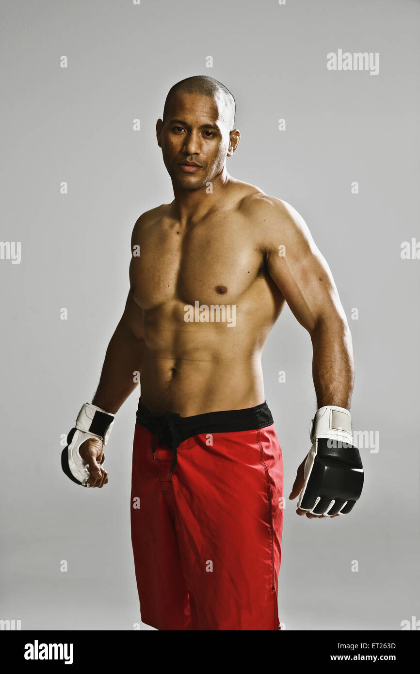 Bald male fighter Stock Photo - Alamy