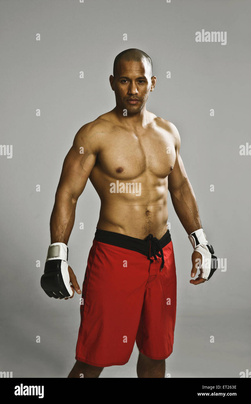 Bald male fighter Stock Photo - Alamy