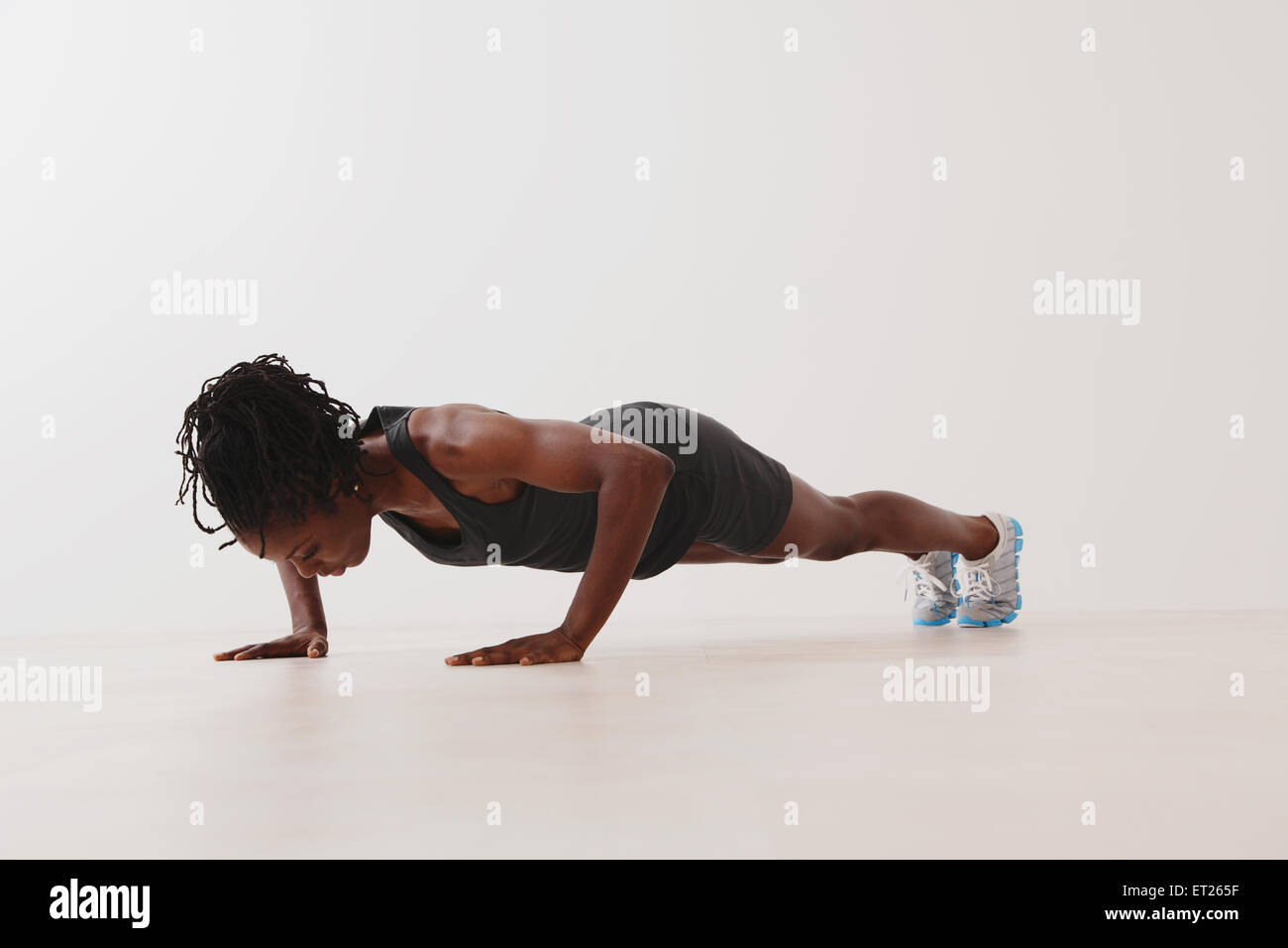 Woman Doing Push-Up Stock Photo - Alamy