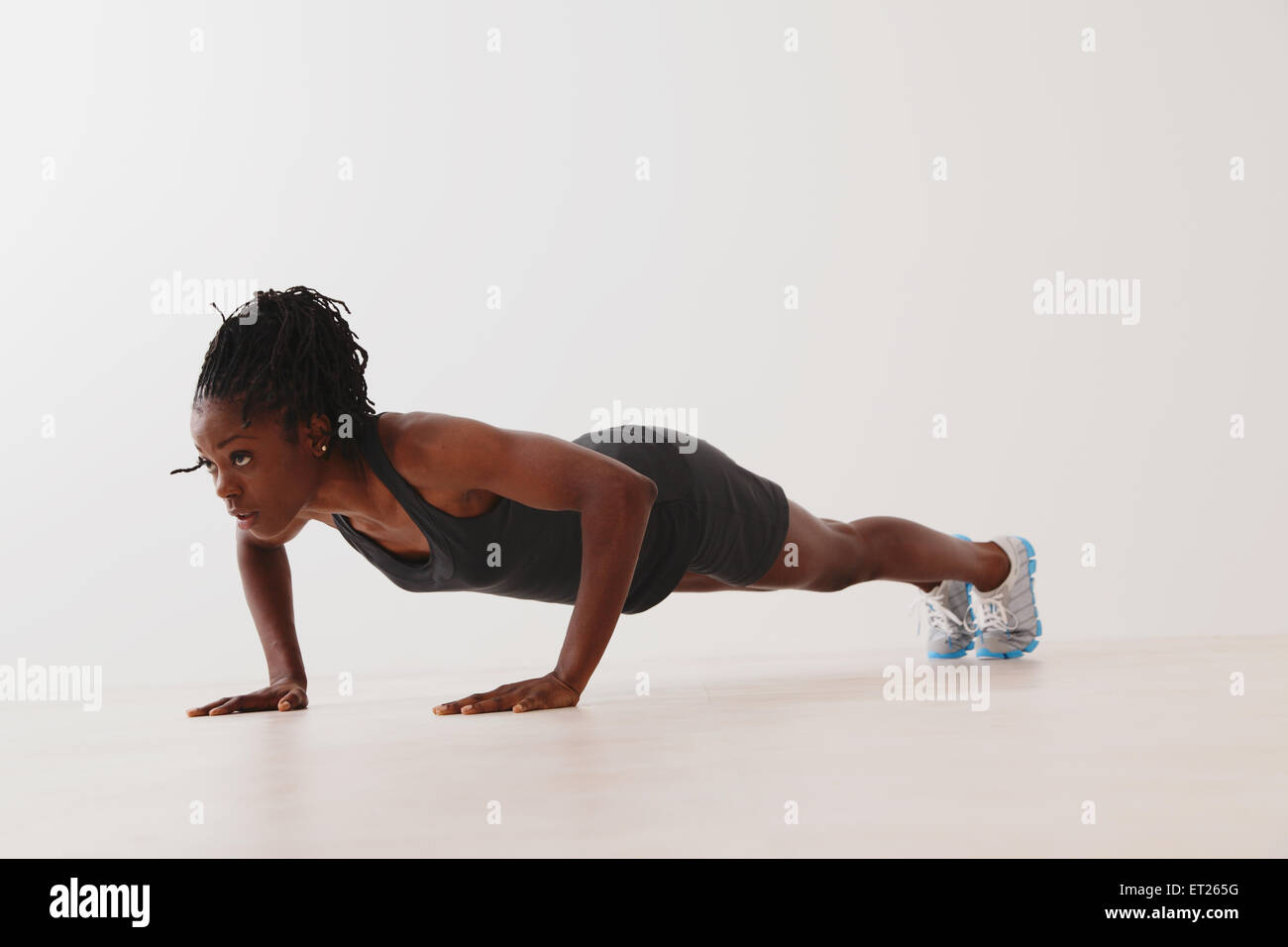 Woman Doing Push-Up Stock Photo - Alamy