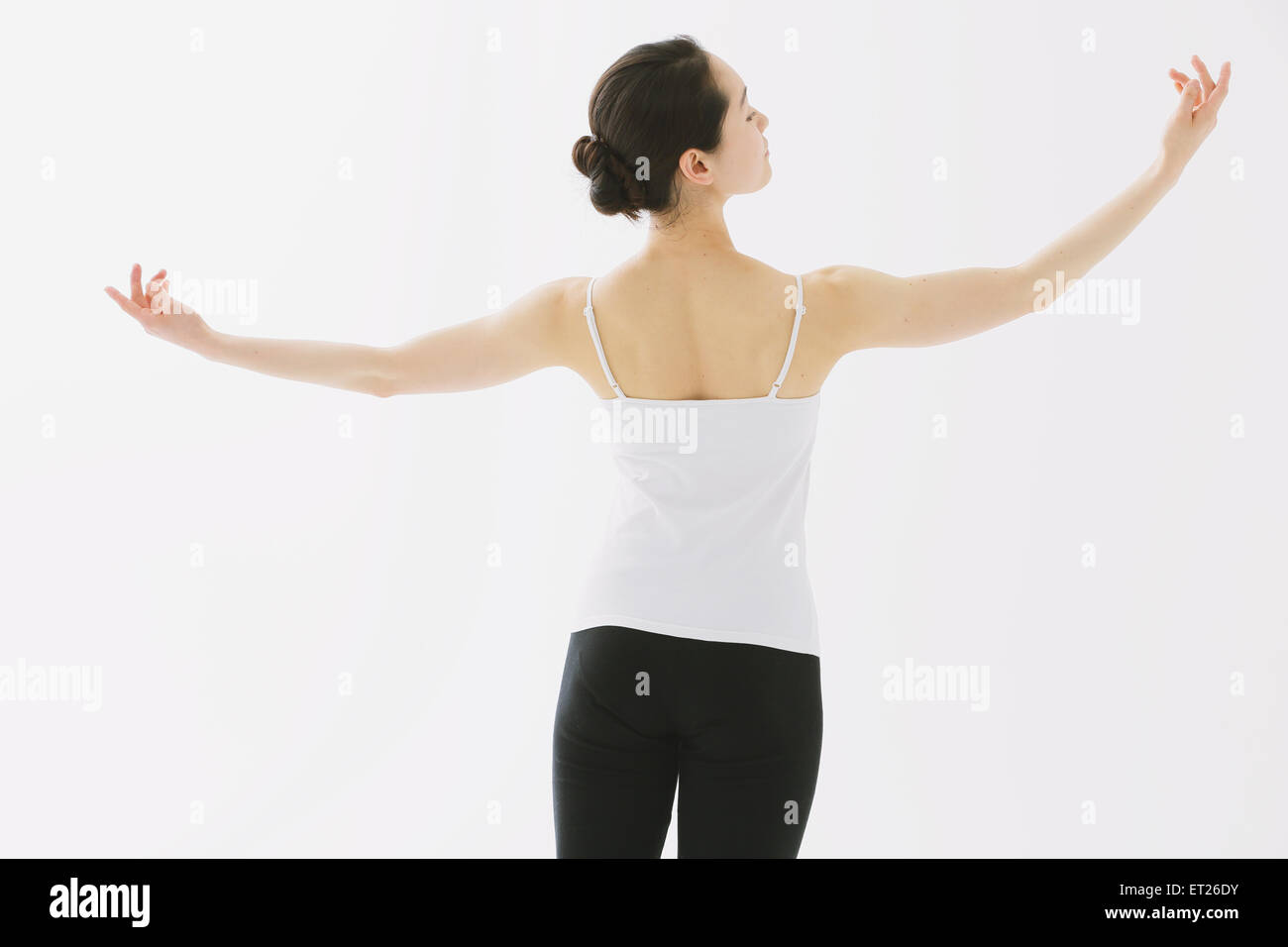 Rear view dancer arms hi-res stock photography and images - Alamy