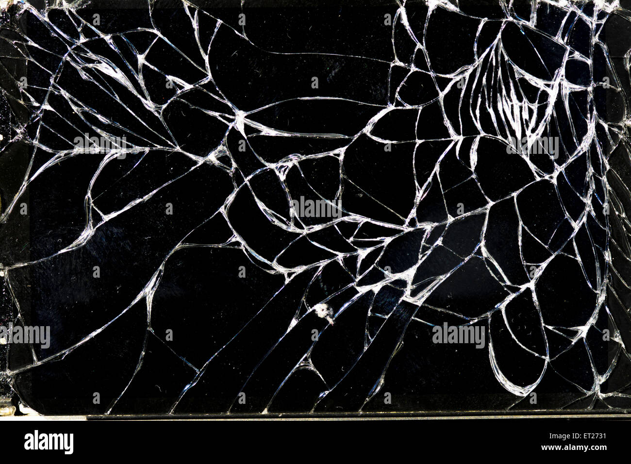 Cracked glass of a broken smart phone Stock Photo - Alamy