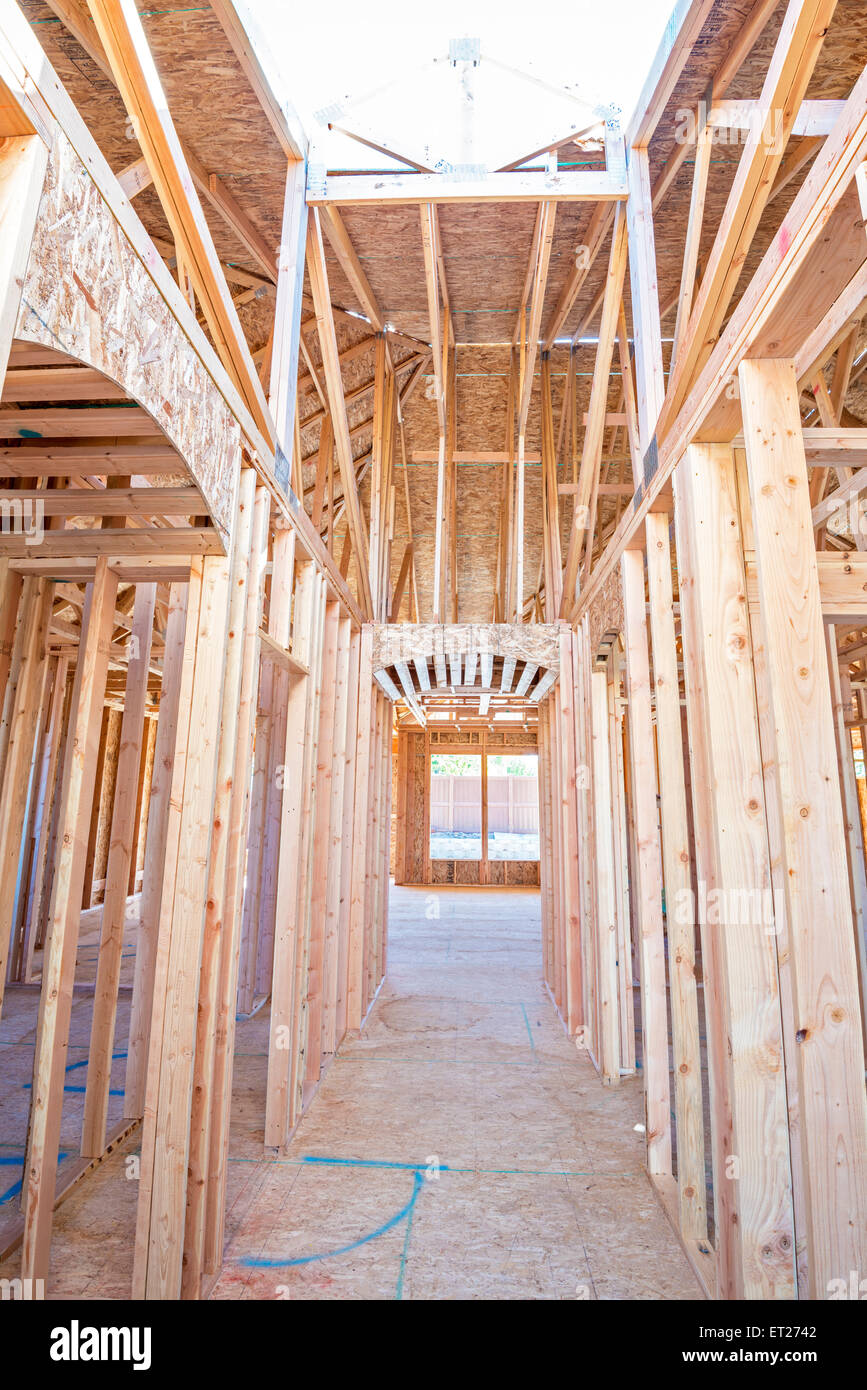 Wood studs in a new home under construction Stock Photo - Alamy