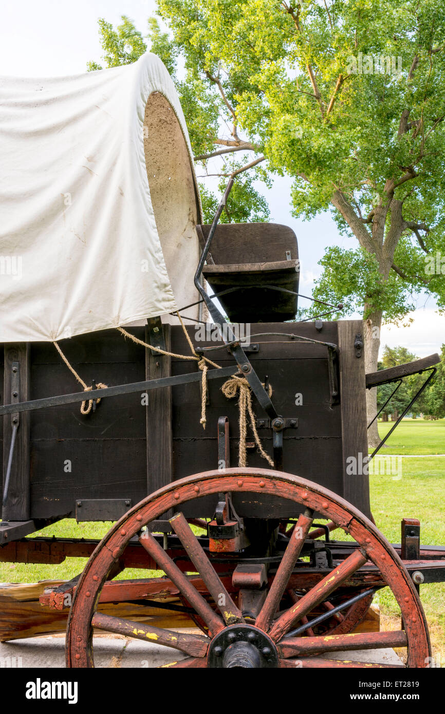 Close up of an original covered wagon in a park Stock Photo - Alamy