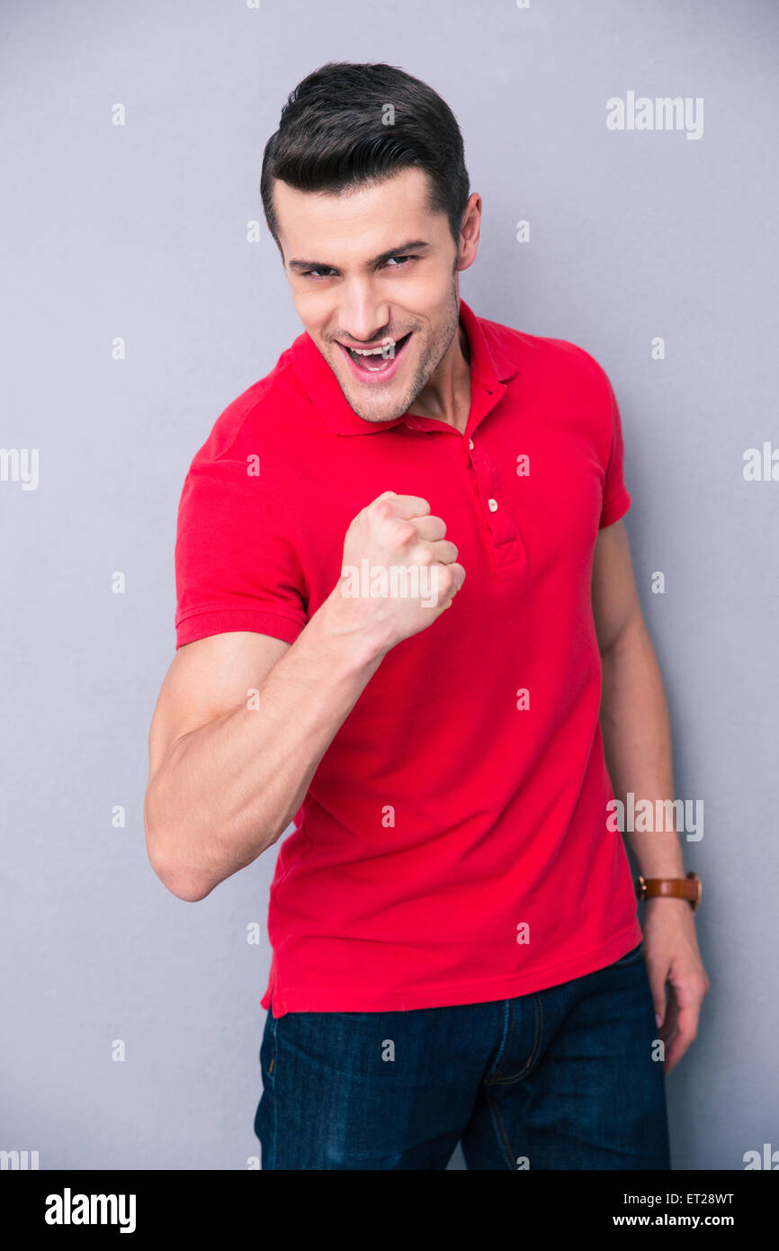 Muscular man flexing camera hi-res stock photography and images - Alamy