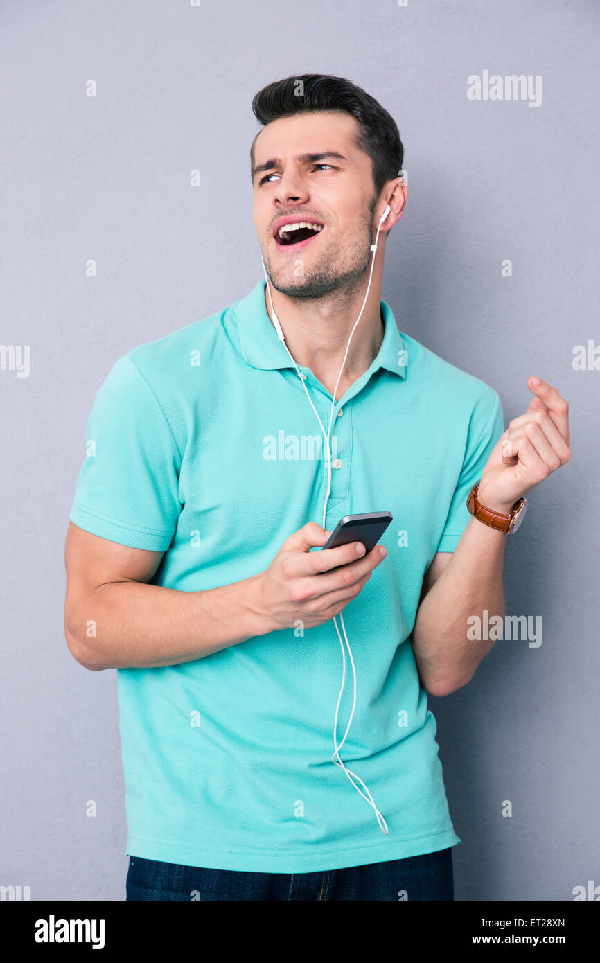 Handsome man singing song hi-res stock photography and images - Alamy