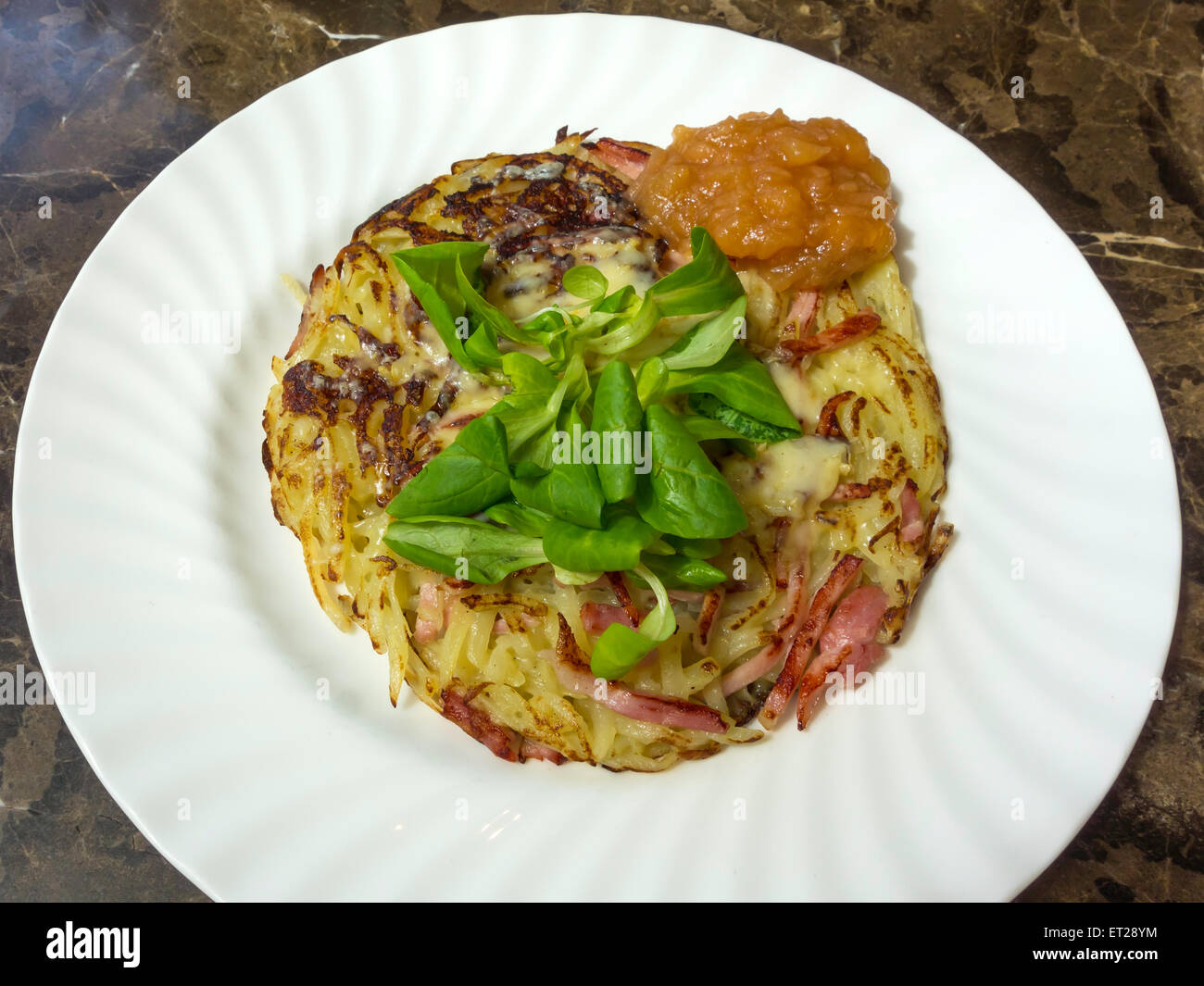 Morning snack in a café Bacon and Raclette Rosti grated potatoes ...