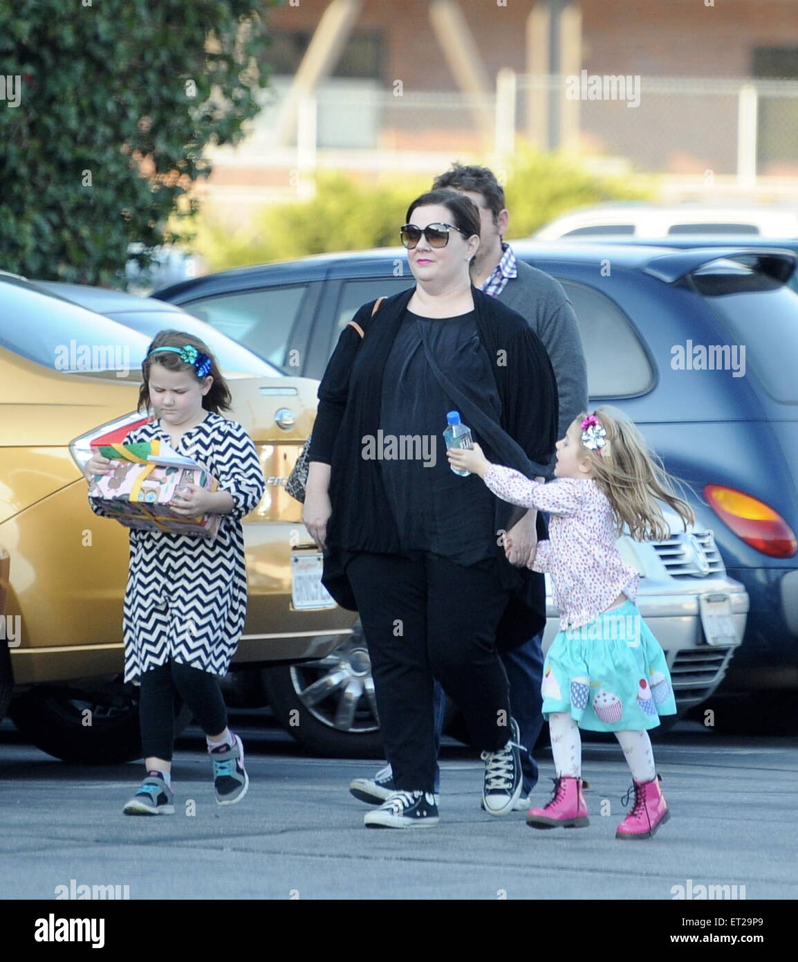 Melissa McCarthy and husband Ben Falcone take their daughters Vivian ...