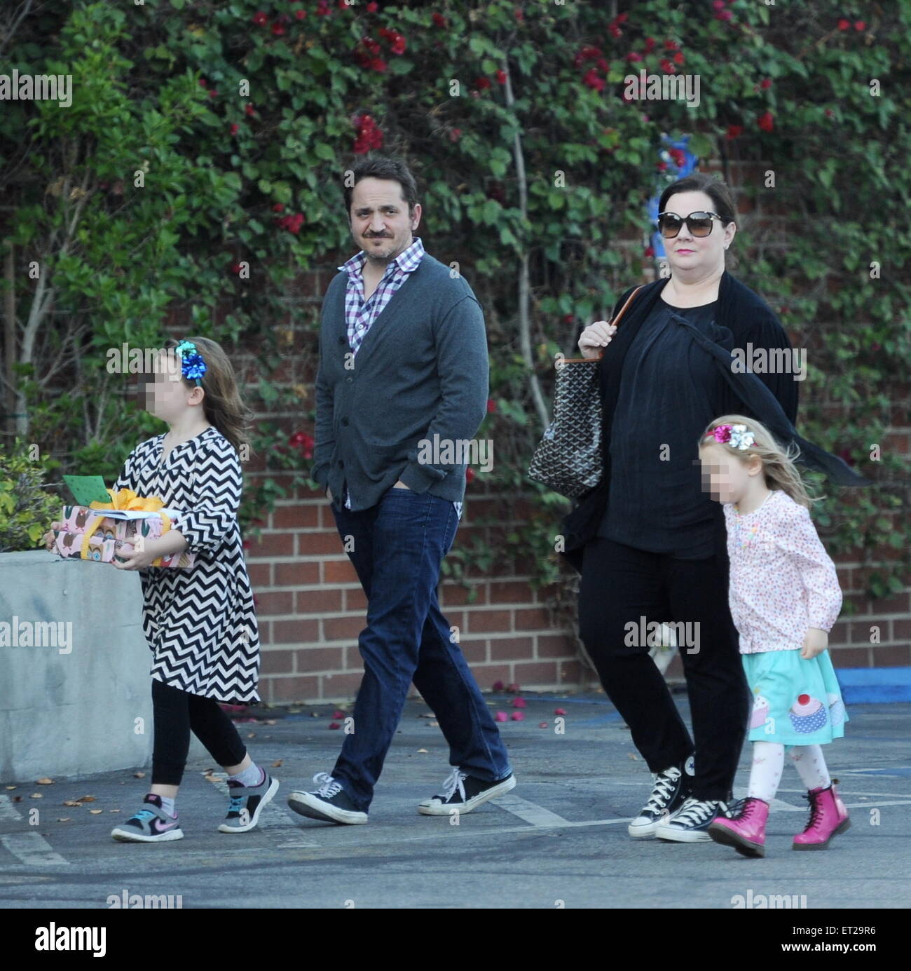 Melissa McCarthy and husband Ben Falcone take their daughters Vivian ...