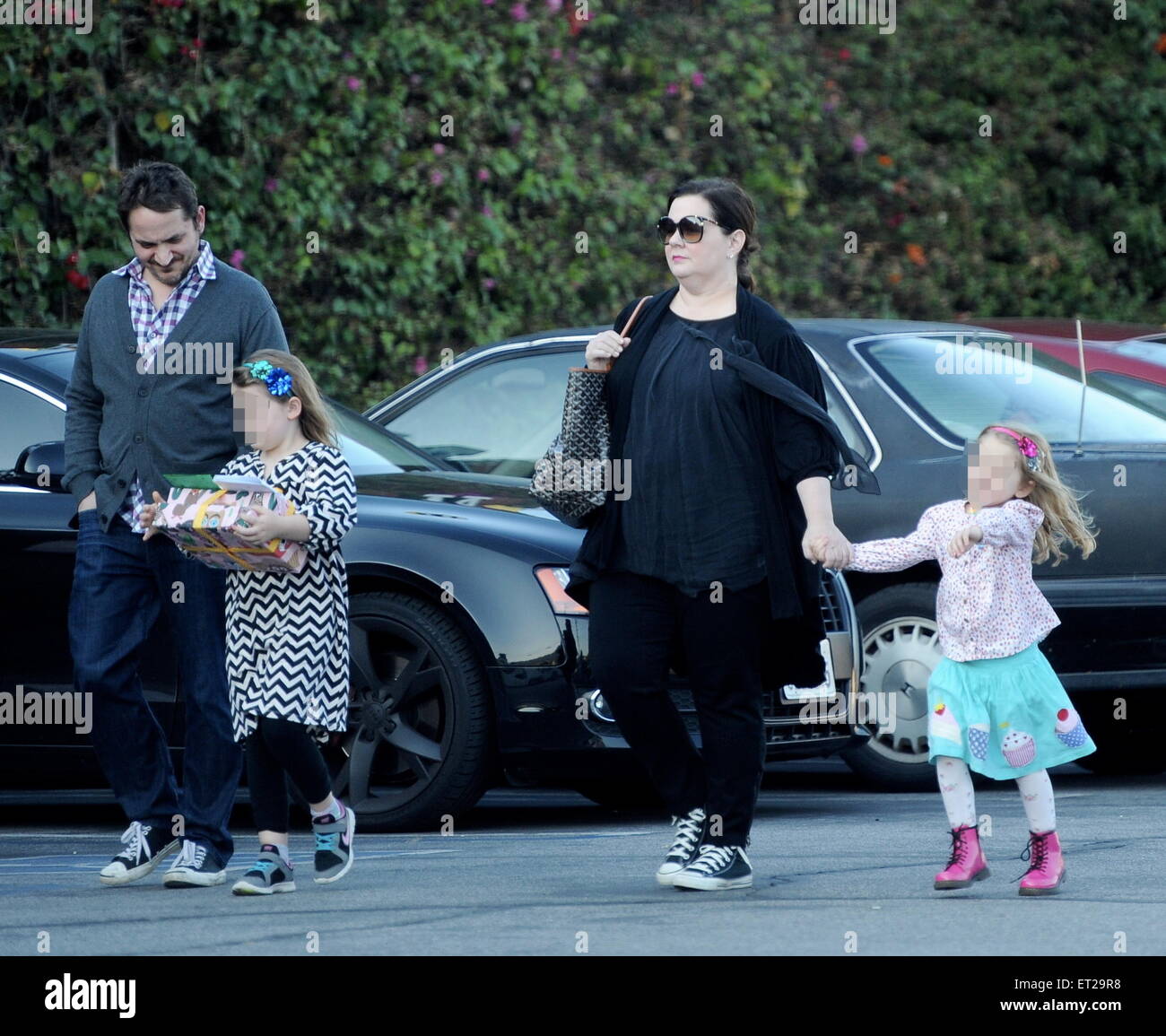 Melissa McCarthy and husband Ben Falcone take their daughters Vivian ...