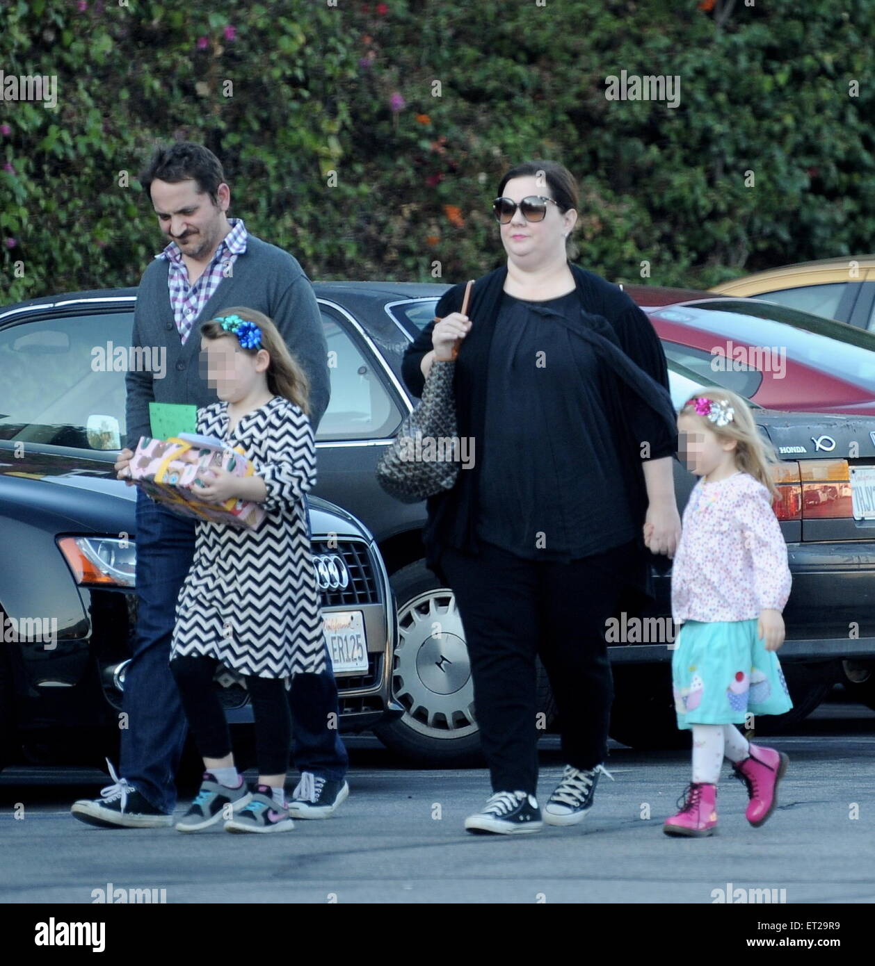 Melissa McCarthy and husband Ben Falcone take their daughters Vivian ...