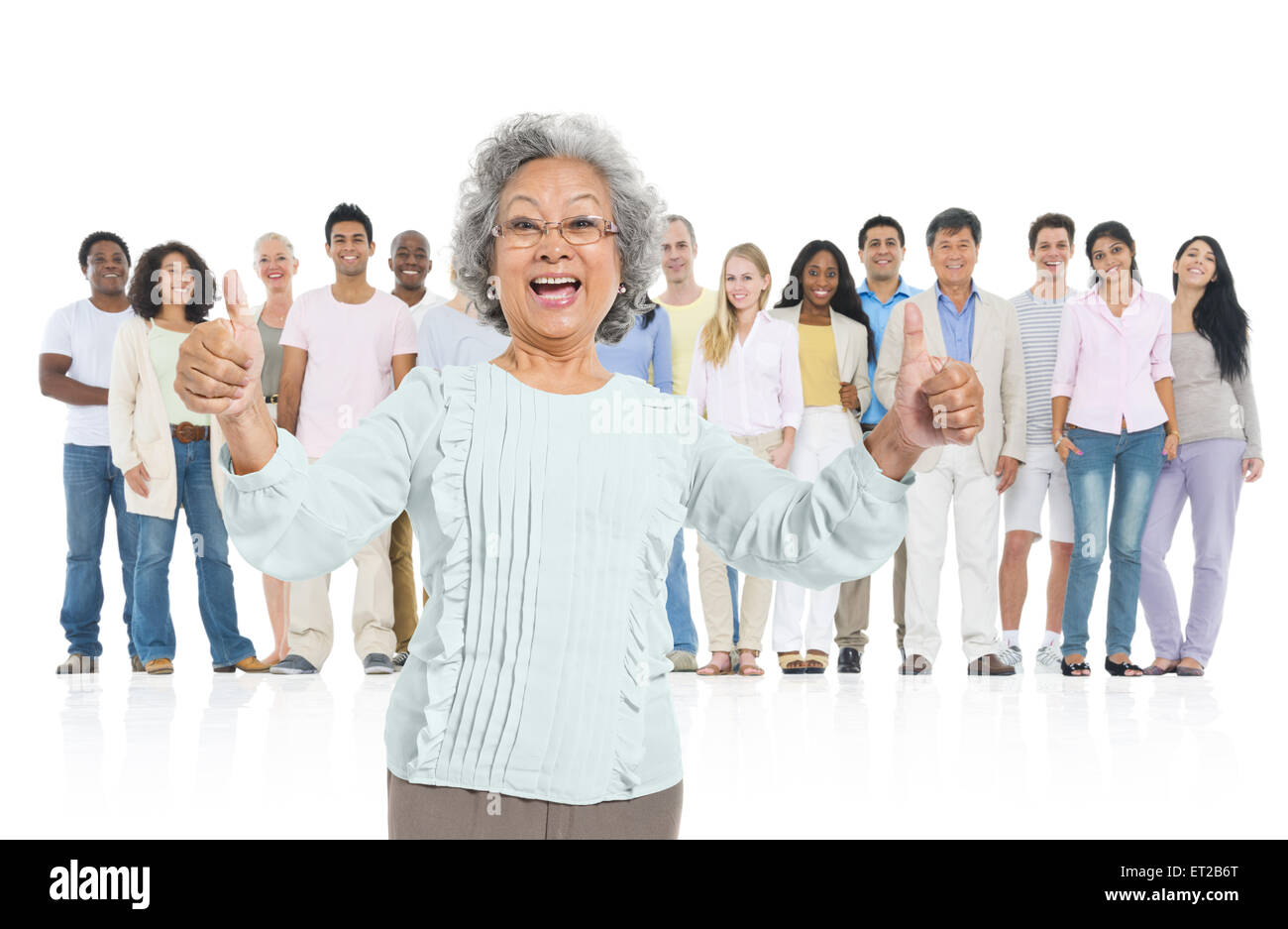 Senior adult feel glad and standing out from crowd Stock Photo - Alamy