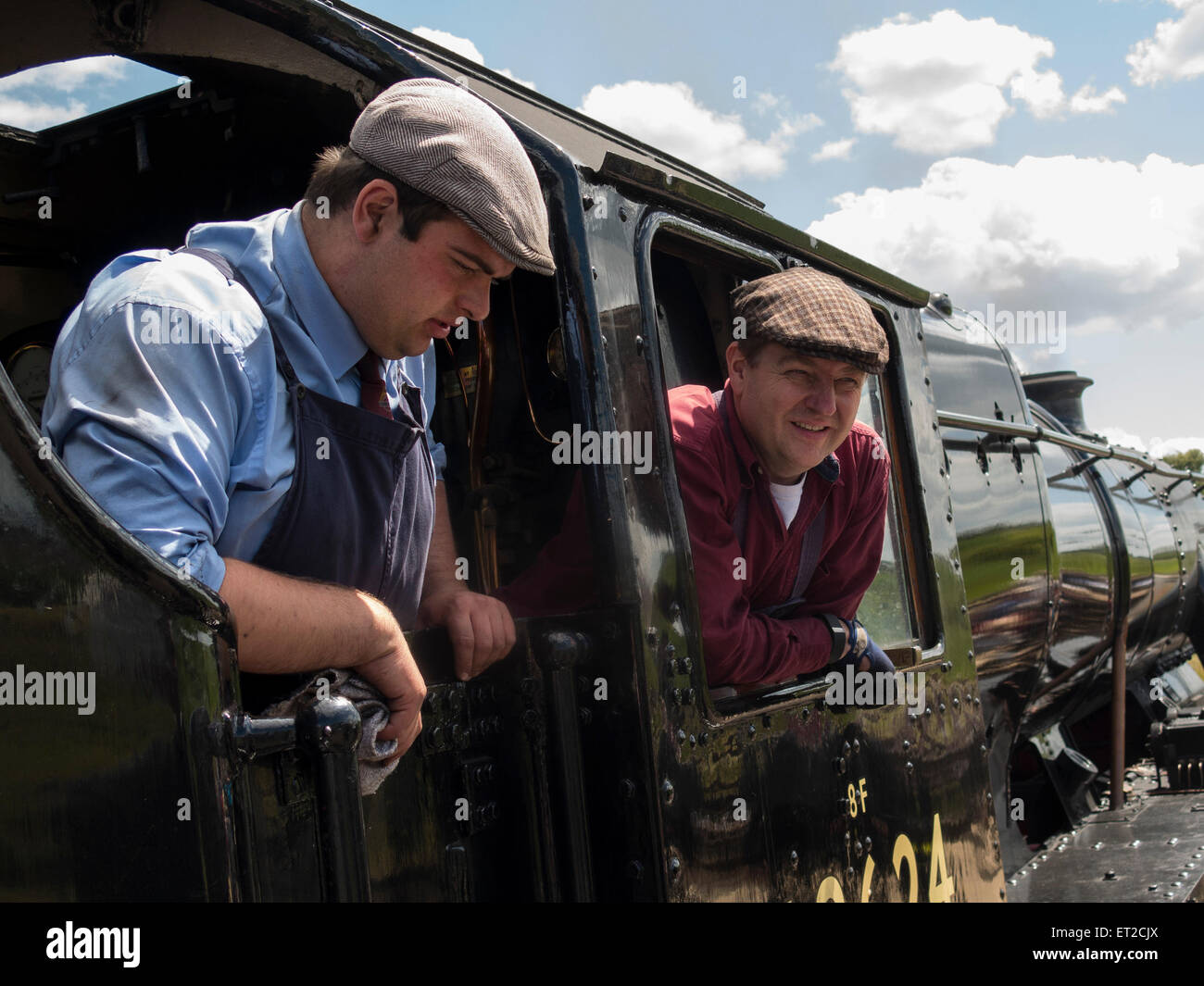 engine driver of a vintage steam locomotive at Loughborough station, on ...