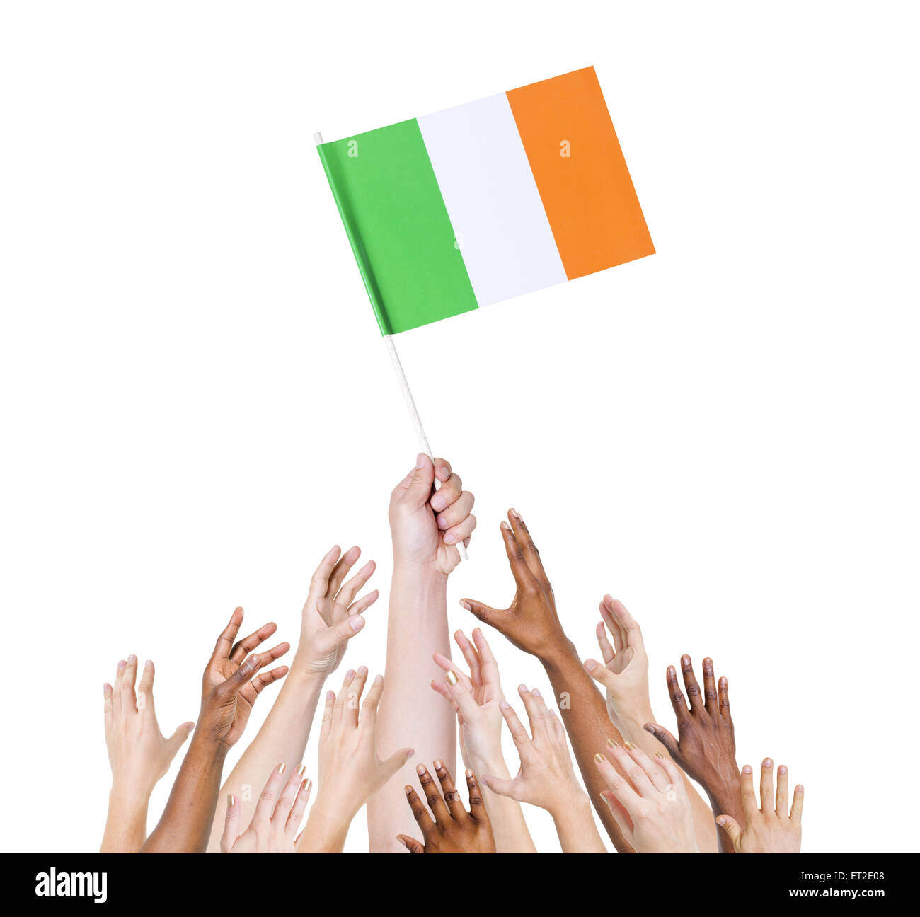 Human hand holding Ireland Flag among multi-ethnic group of people's ...
