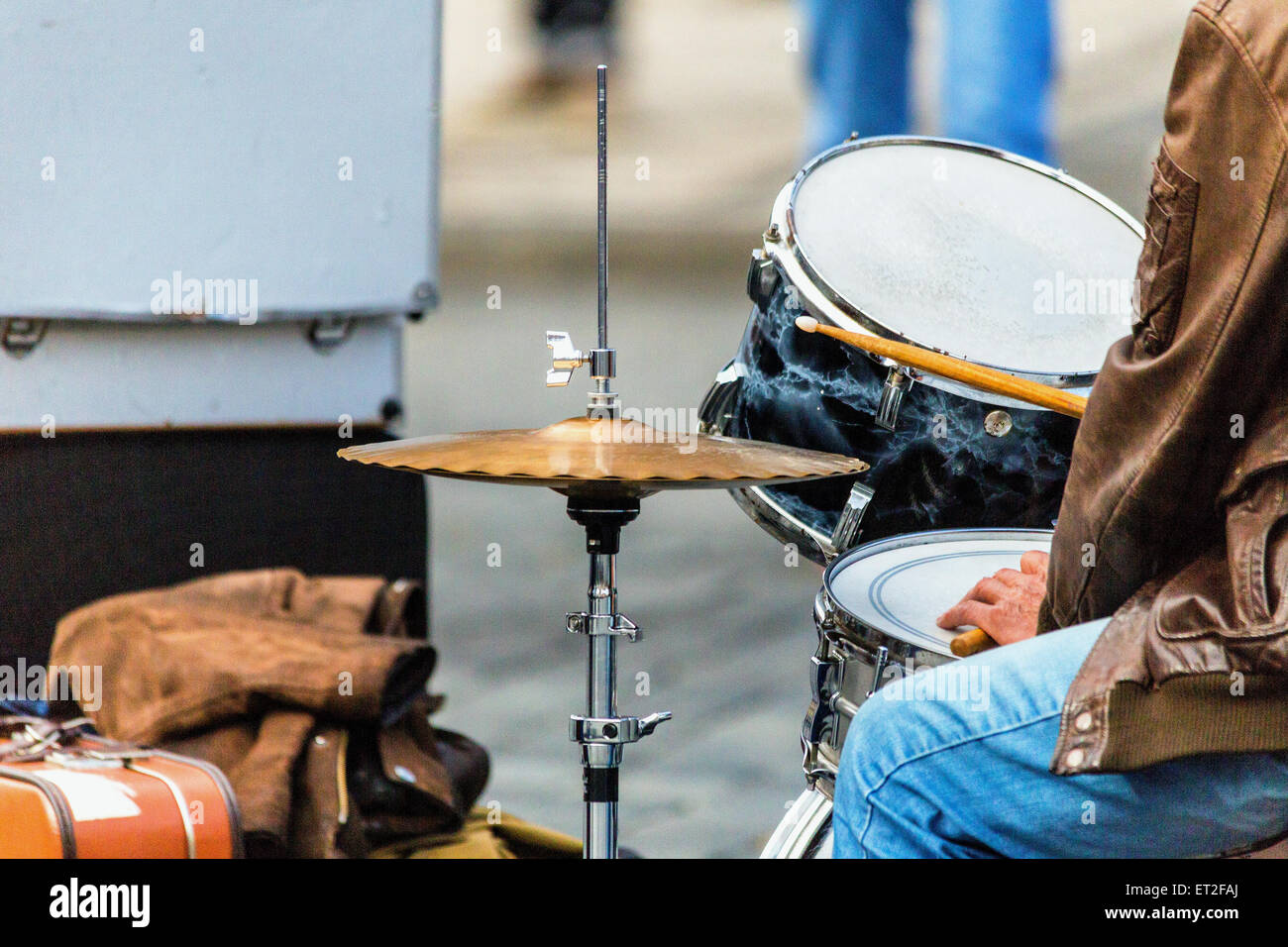 Street drummer playing music in a sunny day: drums, cymbals and ...