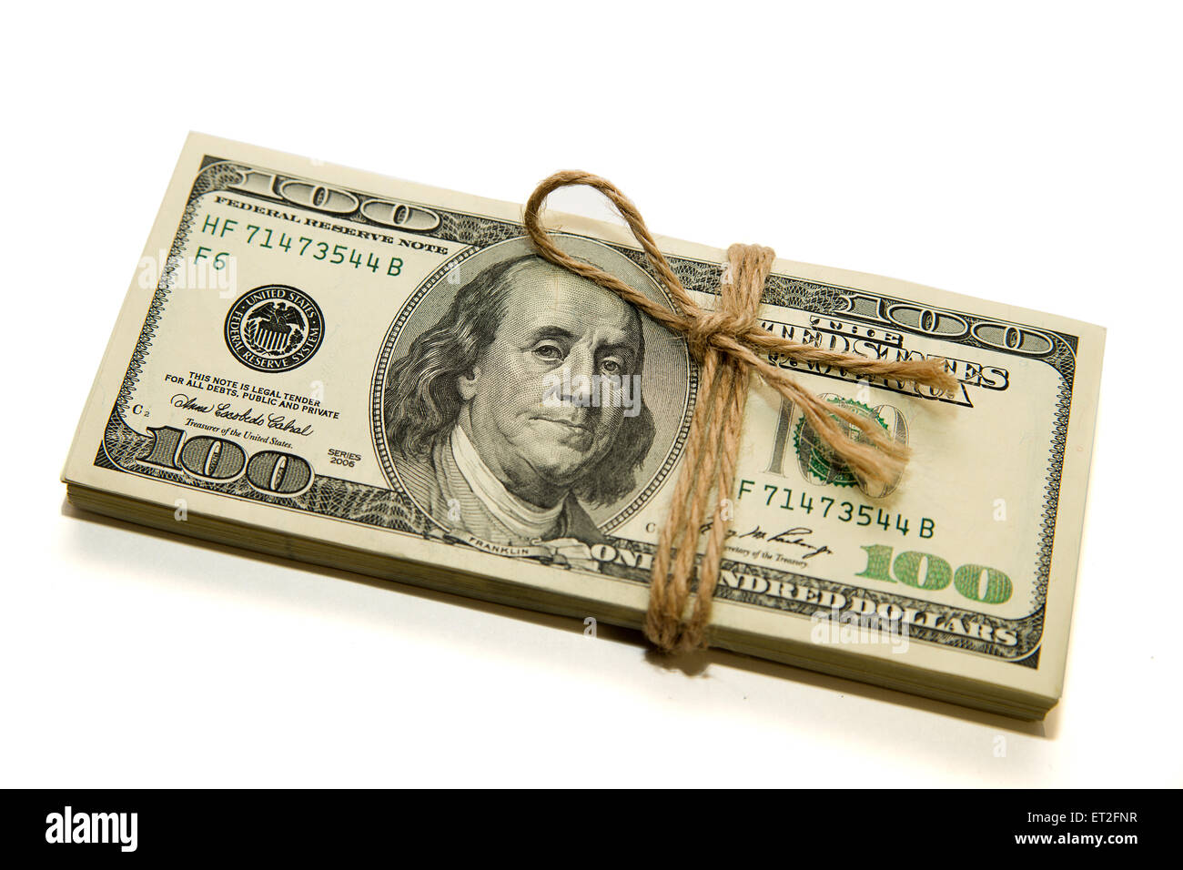 One pack of US dollars banknotes on a white background Stock Photo - Alamy