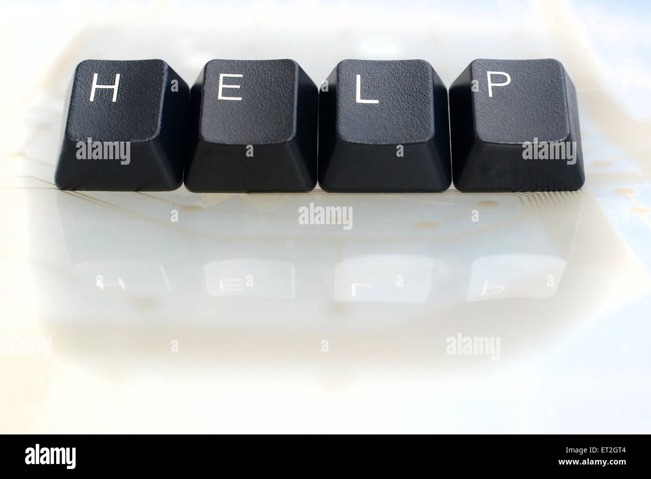 IT HELP - Four Black Keyboard Keys reading word help on White Glass ...