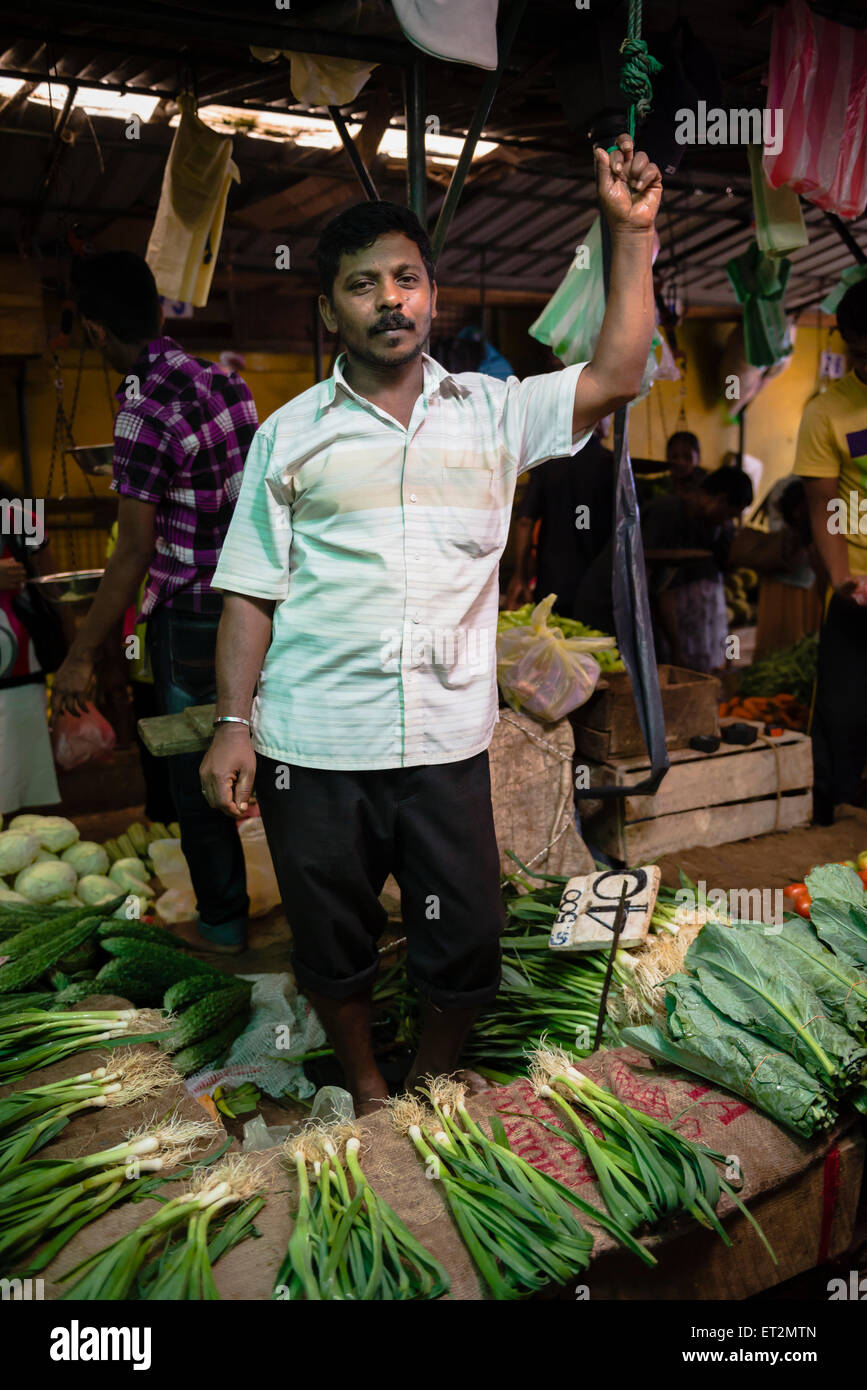 Kandy vegetable market, vegetable seller at his market stall, Kandy ...