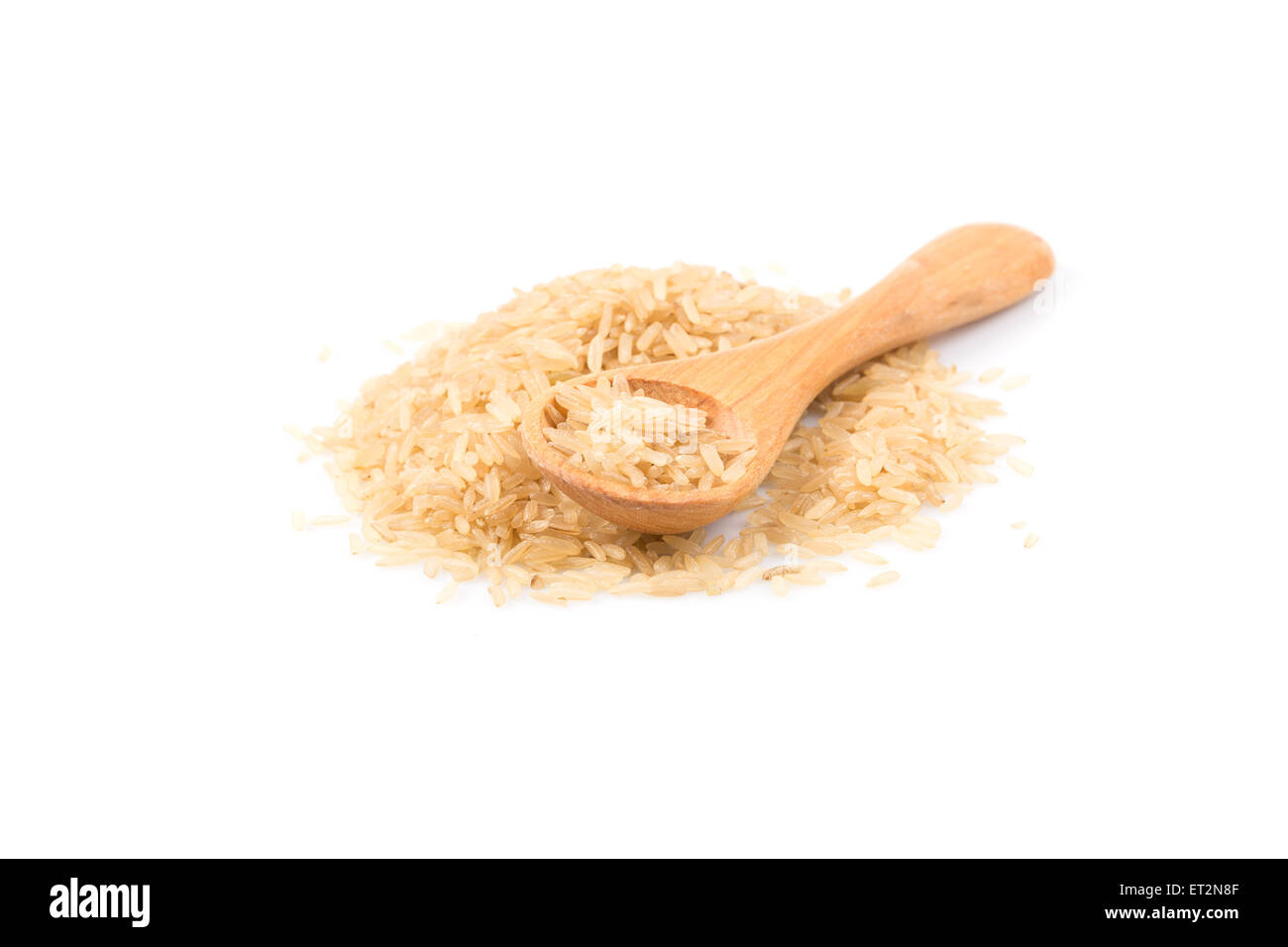 brown rice over the spoon on a white background Stock Photo - Alamy