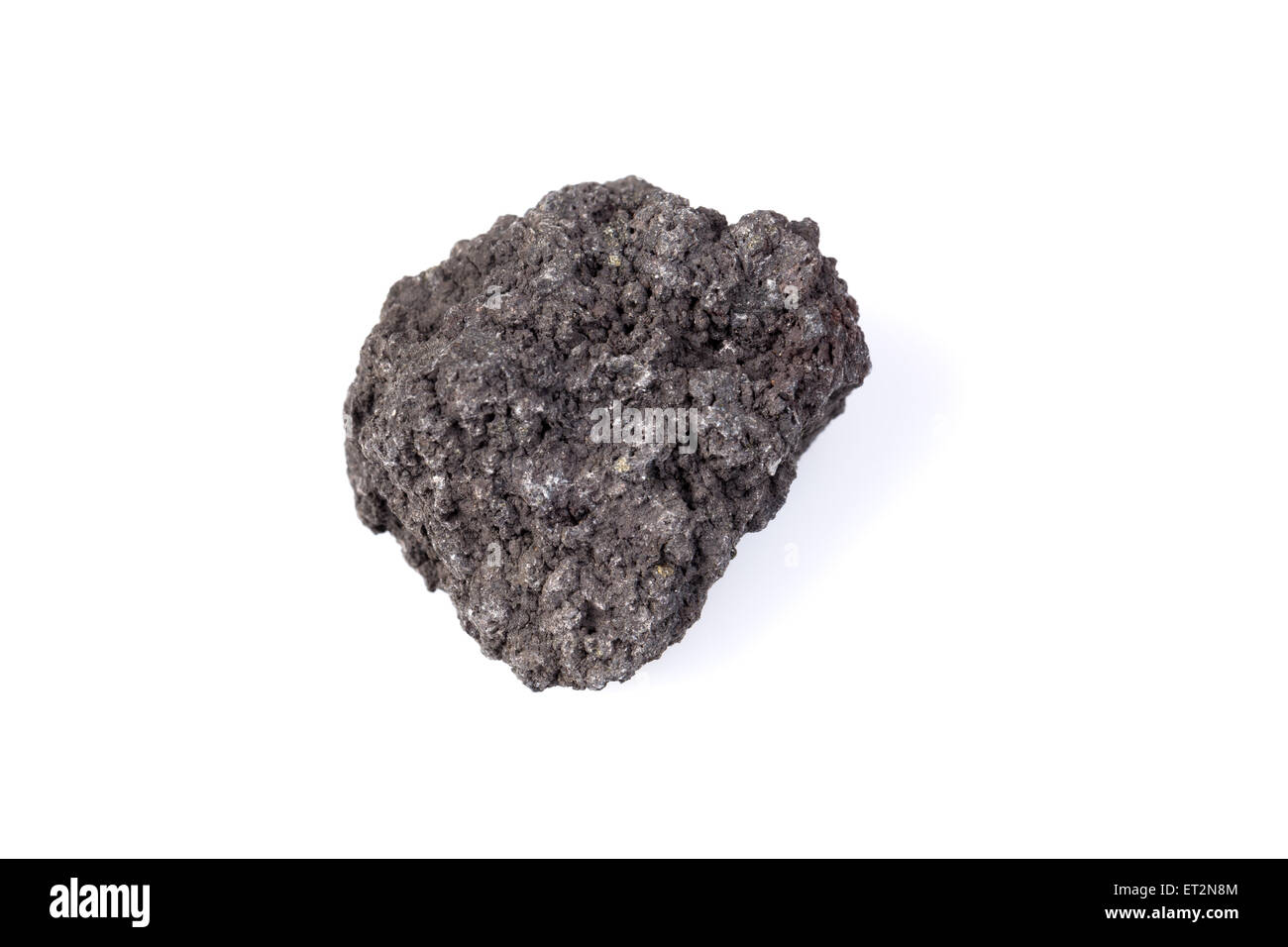 Black lava rock from volcano on a white background Stock Photo - Alamy