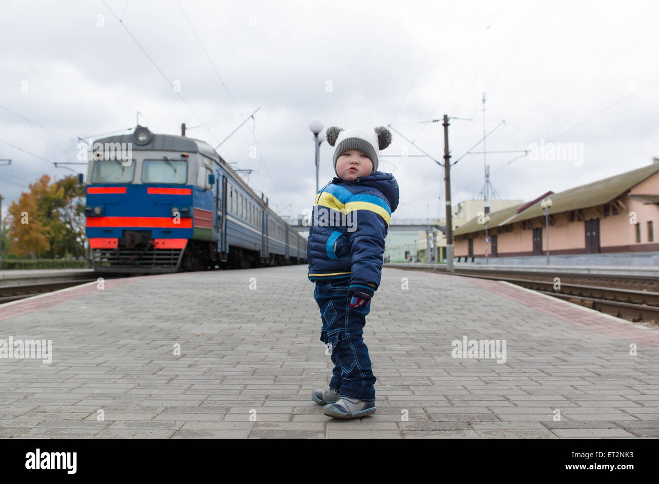 Boy on train platform hi-res stock photography and images - Alamy