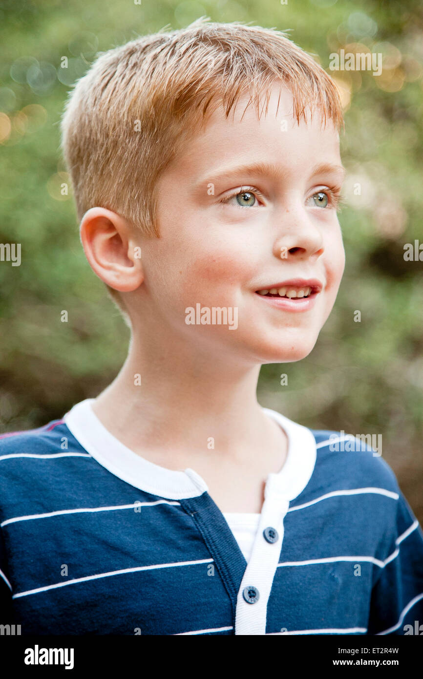 Portrait of a young red haired boy of seven outdoors Stock Photo - Alamy