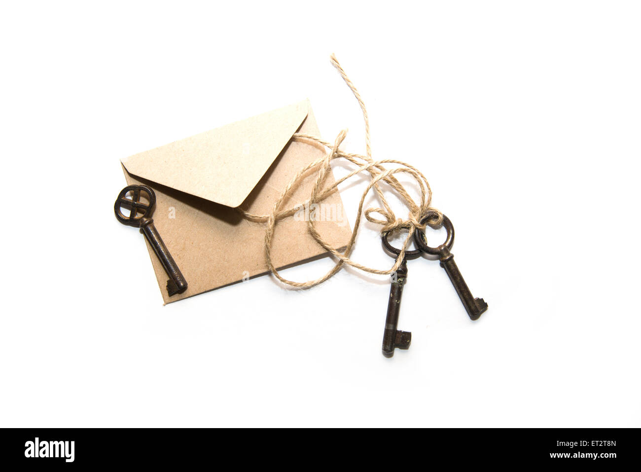 Three oldest keys and envelope on a white background Stock Photo - Alamy