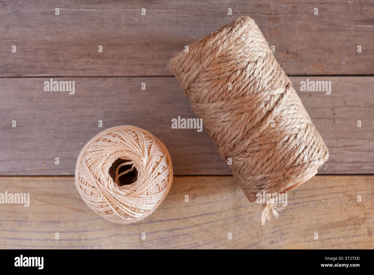 An old cord over a wooden table Stock Photo - Alamy