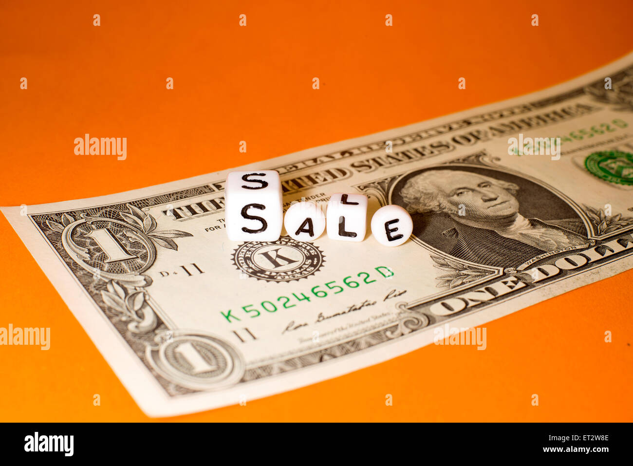 The word "Sale" made up of letters on a orange background Stock Photo ...