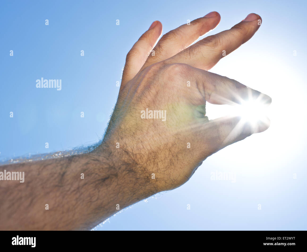 Sun "in the man's hand Stock Photo - Alamy