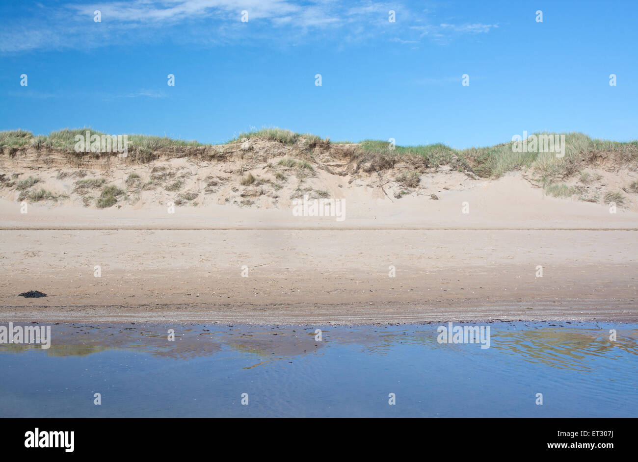 Sand dunes landscape with water and blue sky in Falkenberg, Sweden ...