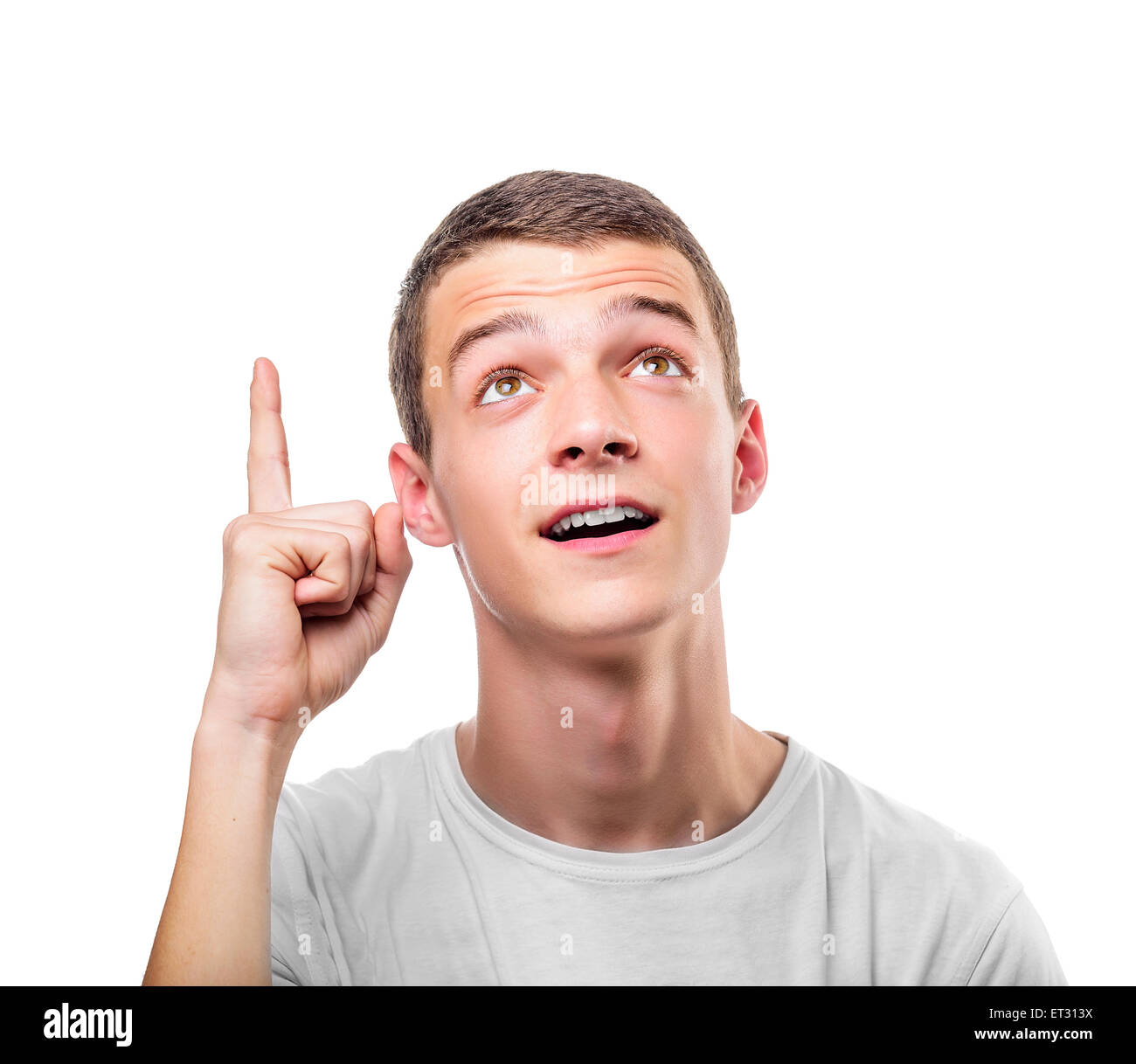 Young man showing upwards index finger Stock Photo - Alamy